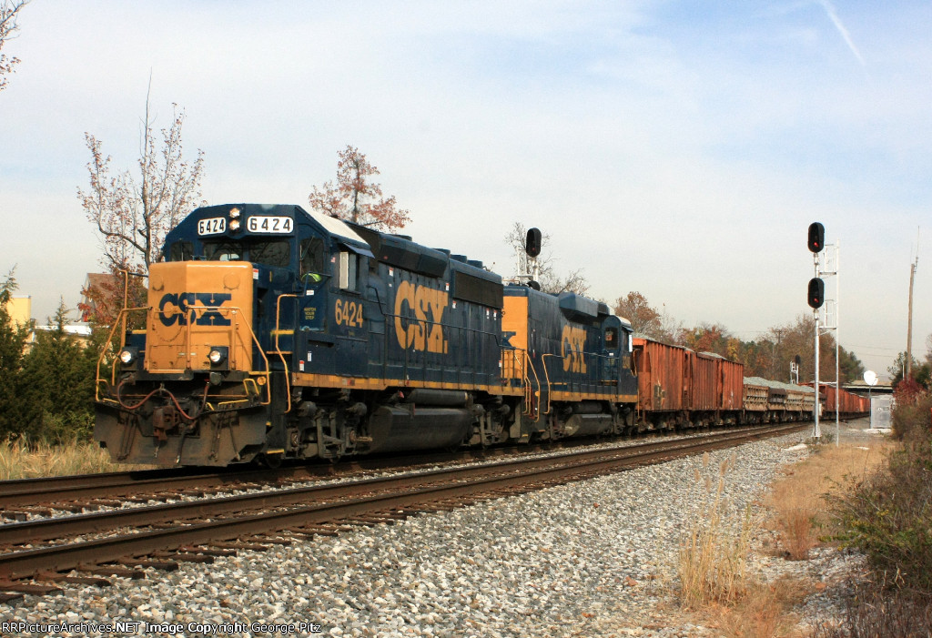 CSX 6424 with loaded ballast train